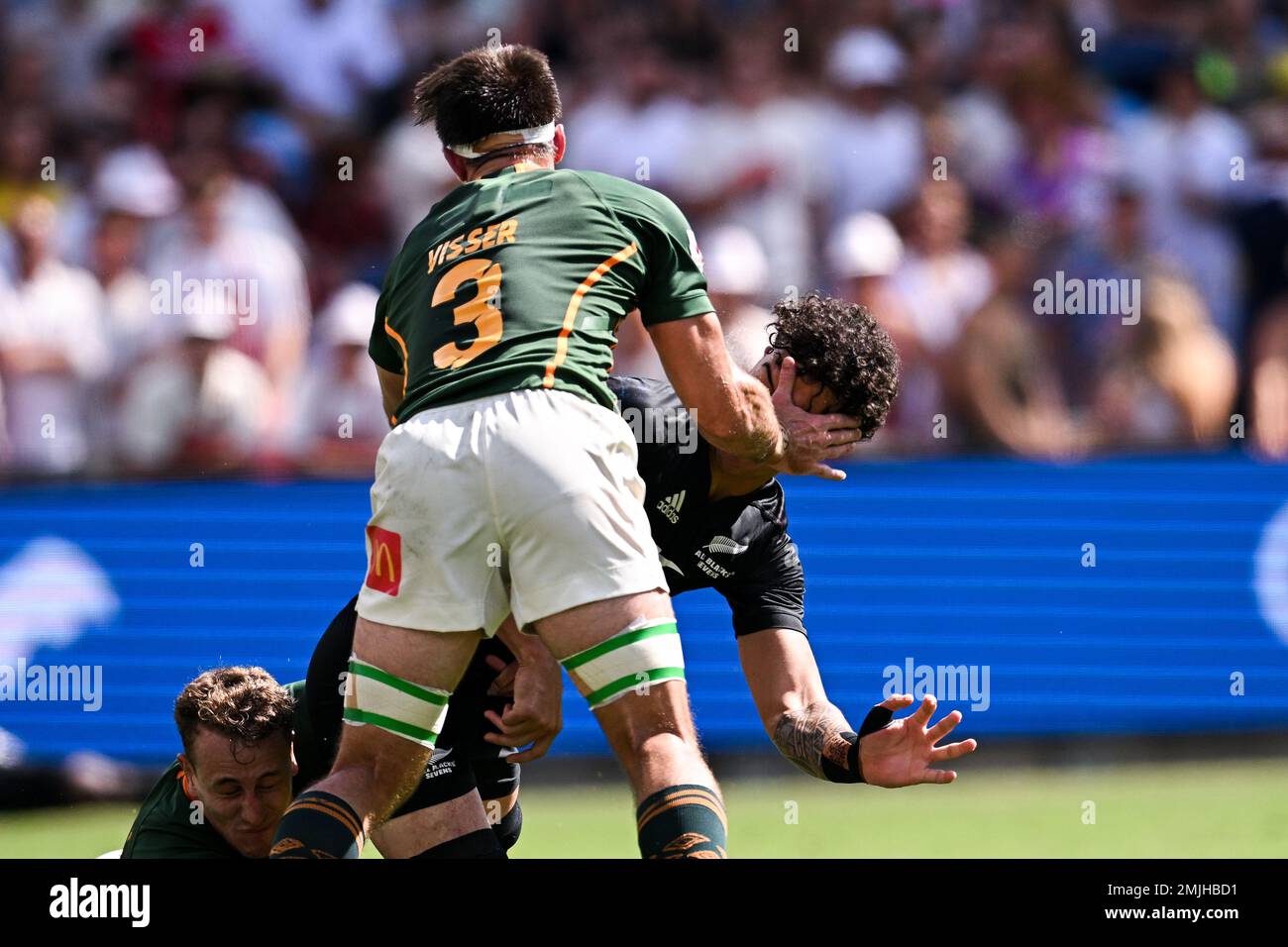 Che Clarke of New Zealand is rubbed in the face by Impi Visser of South ...