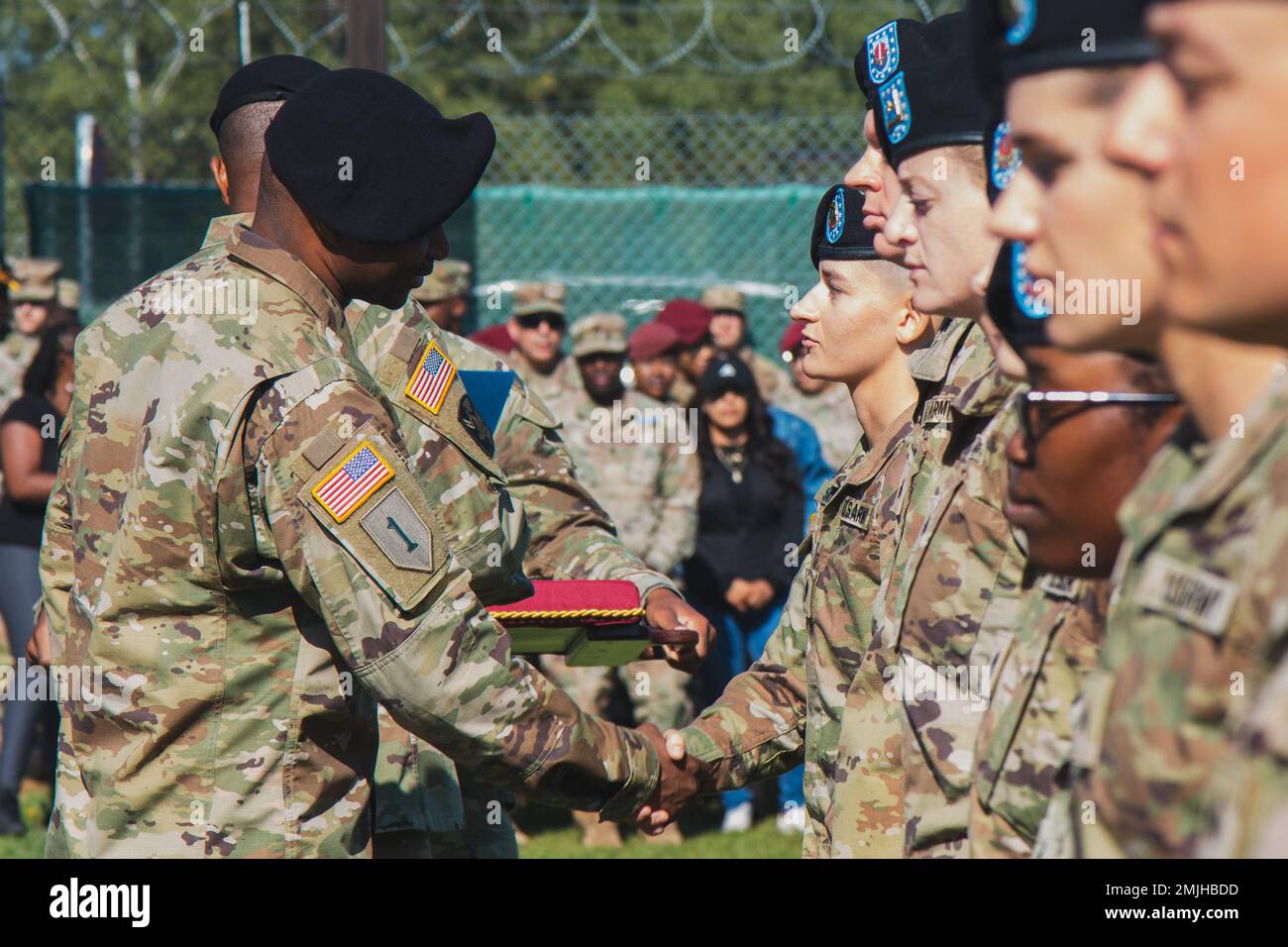 Command Sgt. Maj. Charles L. Robinson III (left) and Command Sgt. Maj ...