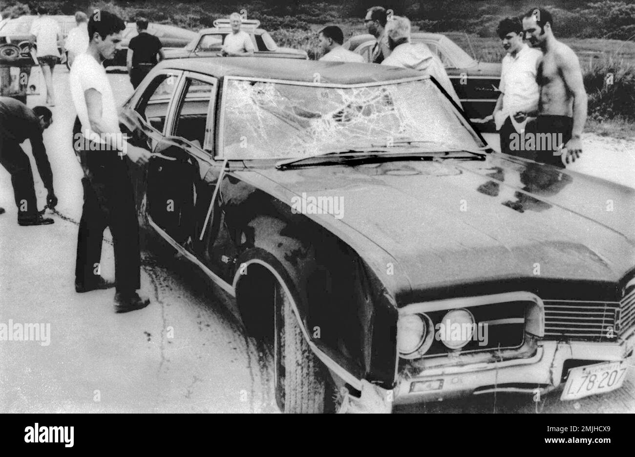 FILE - In this July 18, 1969 file photograph, curious onlookers inspect ...