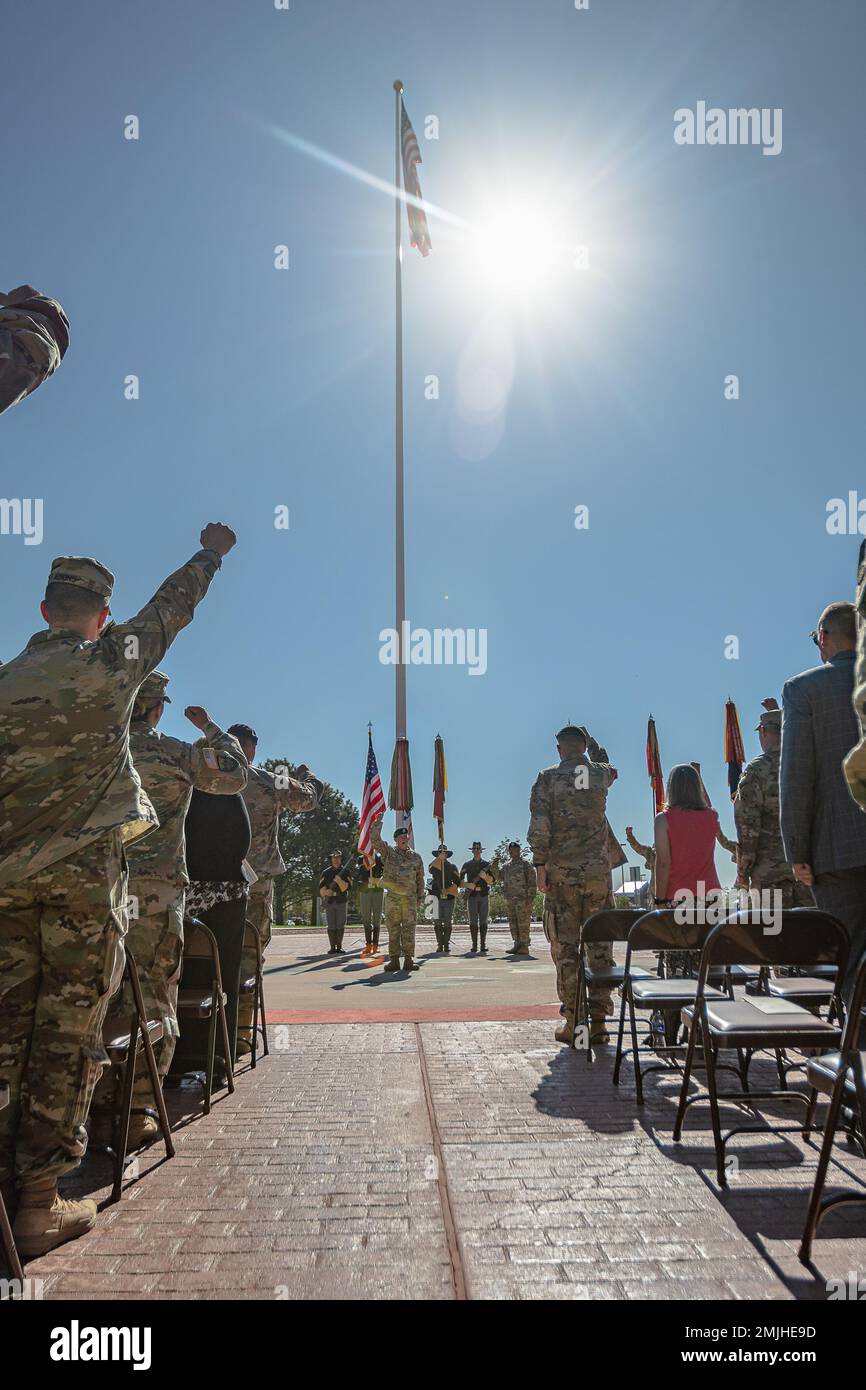 Ivy leaders and Soldiers raise their right fists during the 4th ...