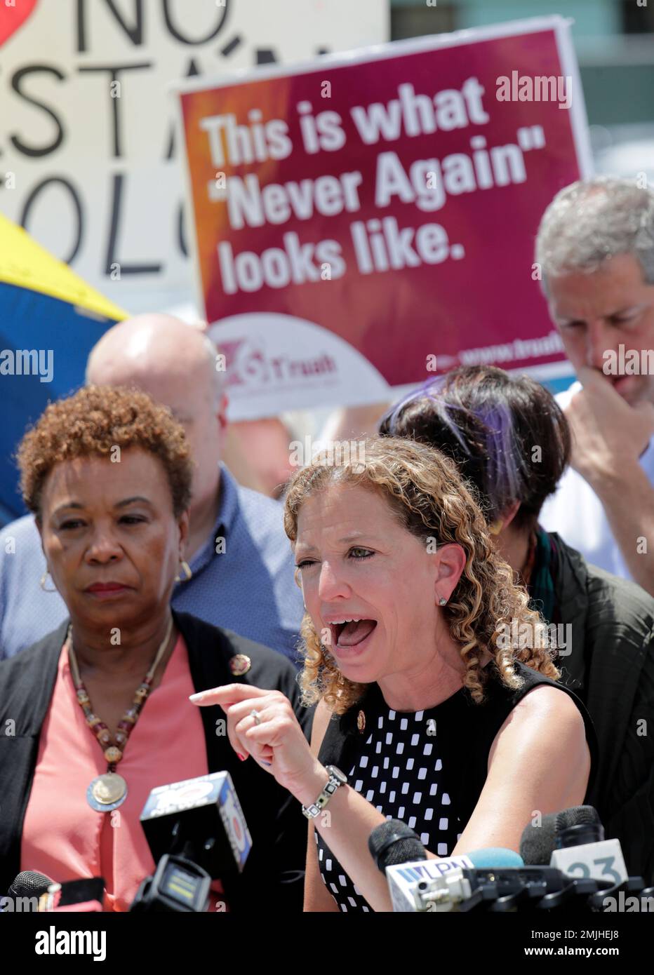 Rep. Debbie Wasserman Schultz, D-Fla., right, speaks during a news ...