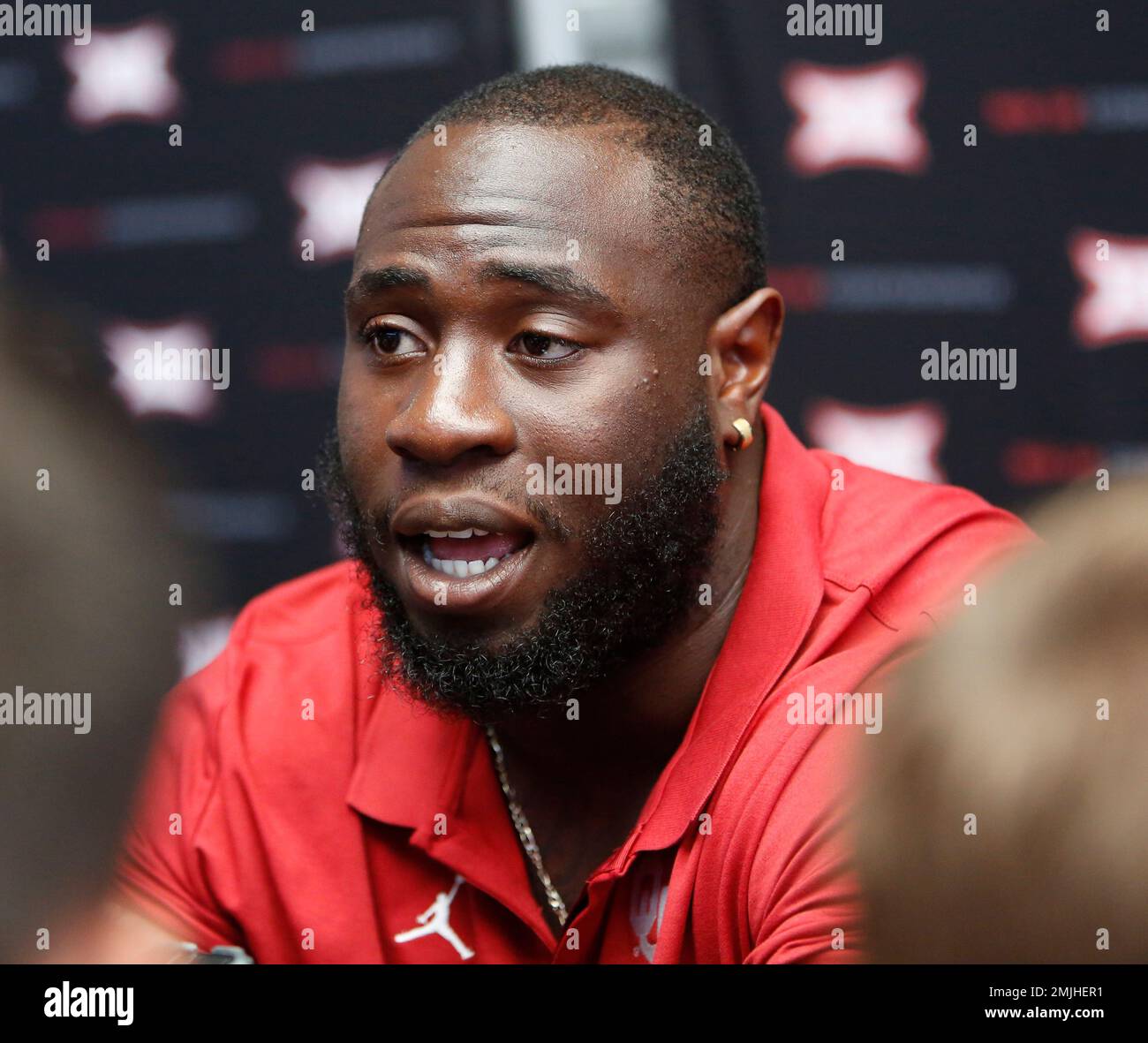 Oklahoma defensive lineman Neville Gallimore speaks to the media on the ...