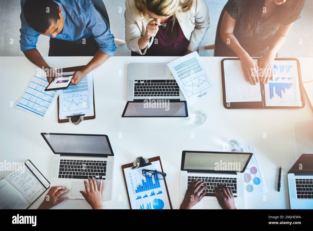 Working their business magic. High angle shot of a team of ...