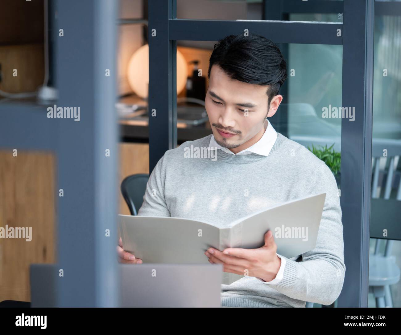 A young business man at work Stock Photo - Alamy