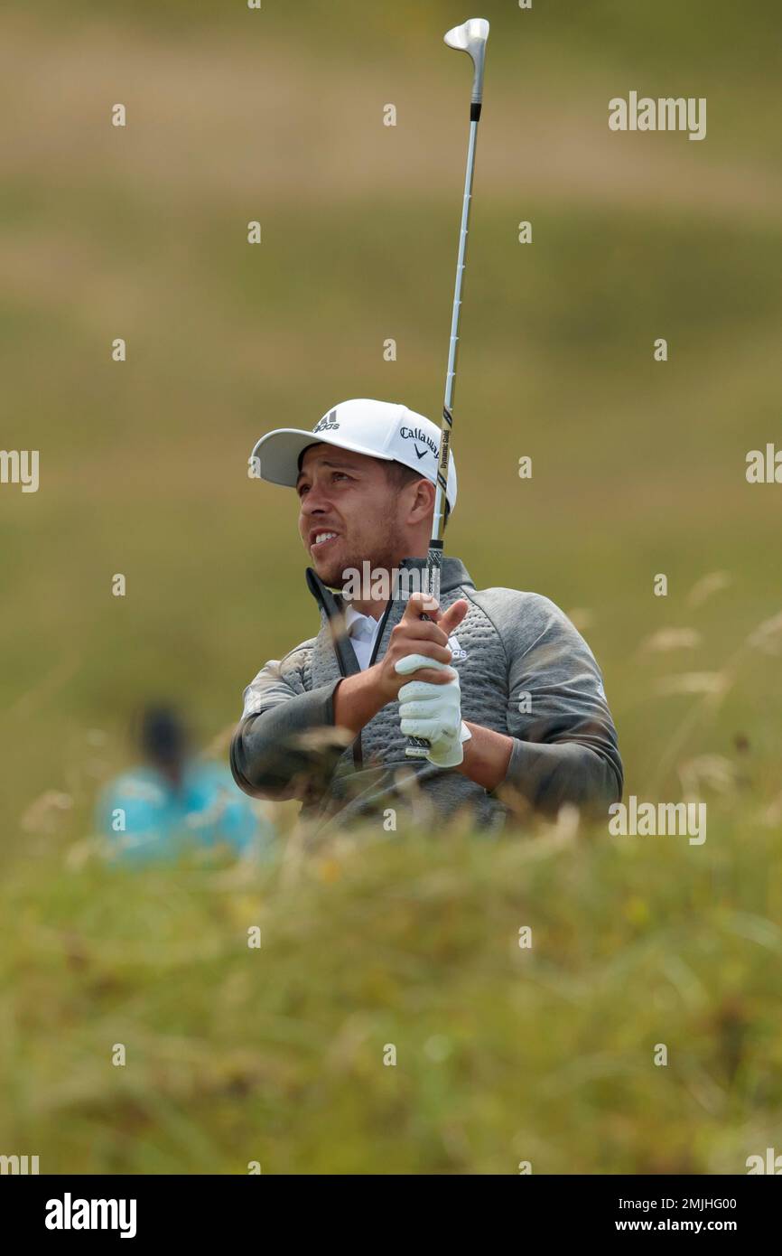 Xander Schauffele of the United States plays to the 5th green during a ...