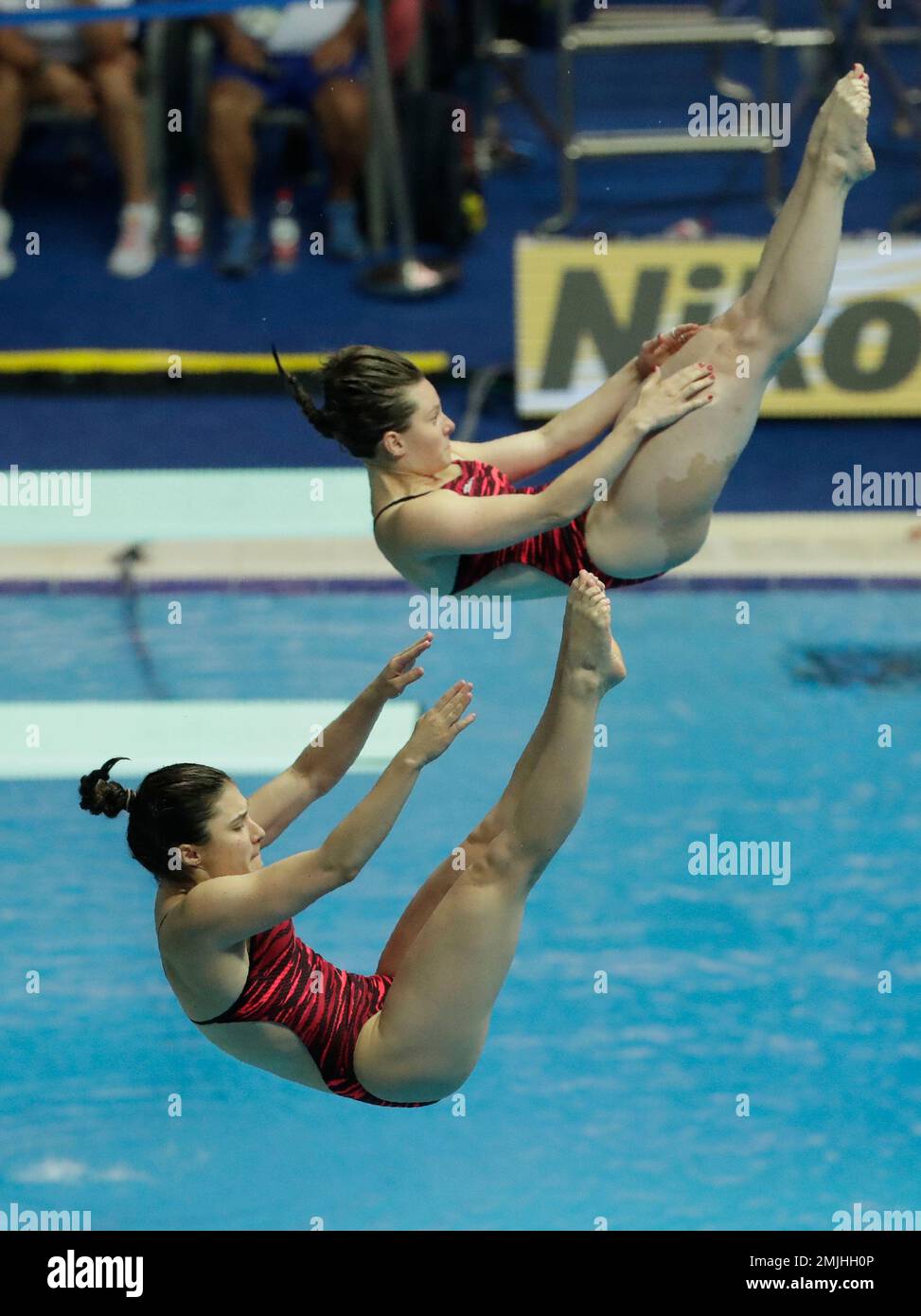 Madeline Coquoz and Jessica-Floriane Favre of Switzerland compete ...
