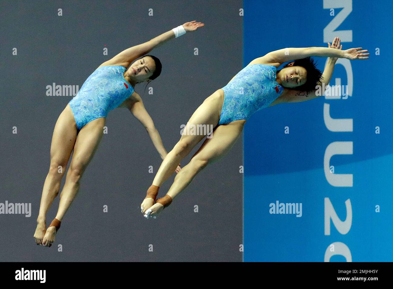 Shi Tingmao and Wang Han of China compete in the preliminary of the ...