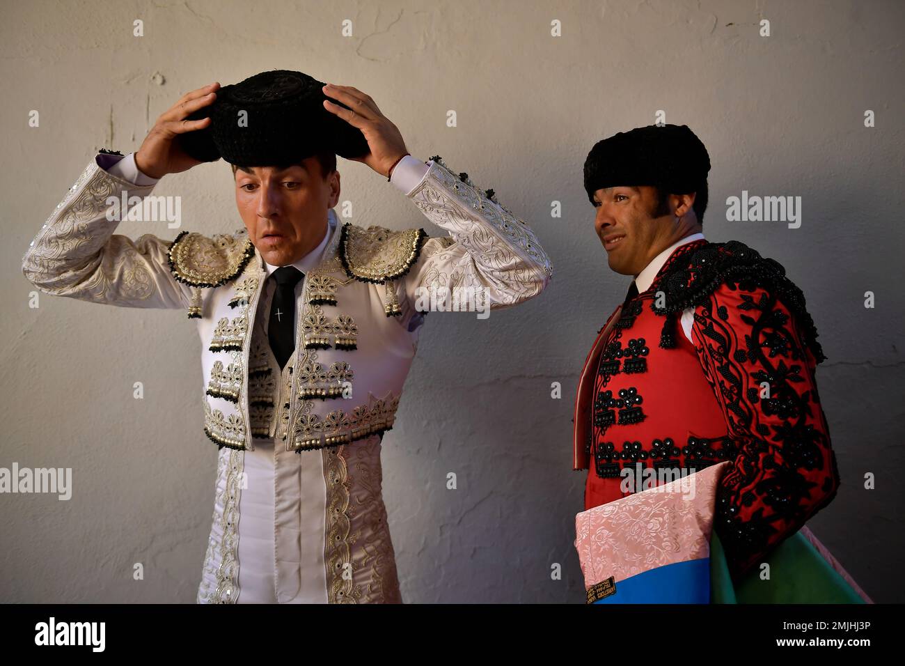 Spanish bullfighter Octavio Chacon, left, adjusts his ''montera ...