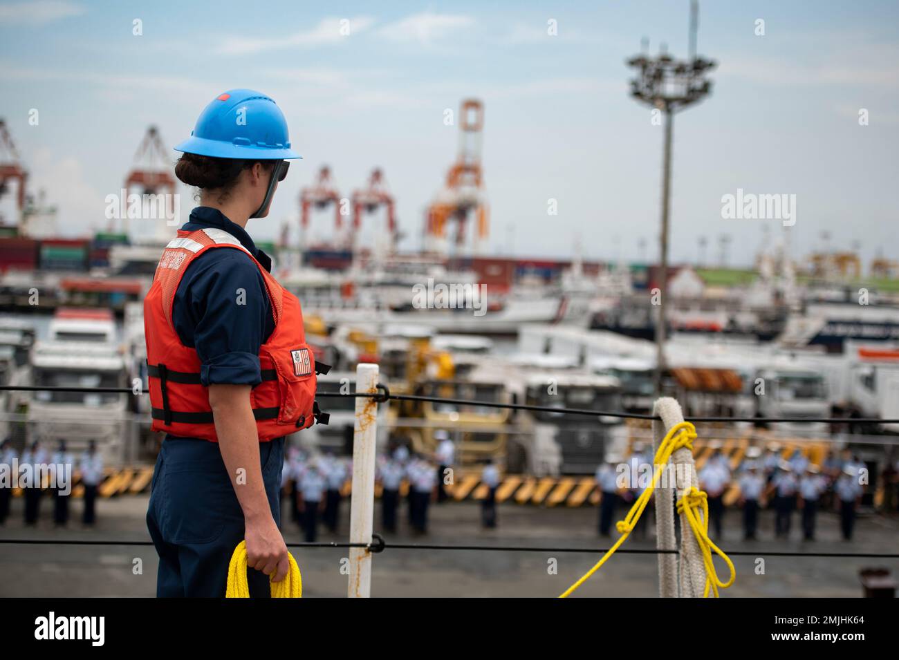 U.S. Coast Guard Petty Officer 2nd Class Caitlyn Maronde looks at the ...