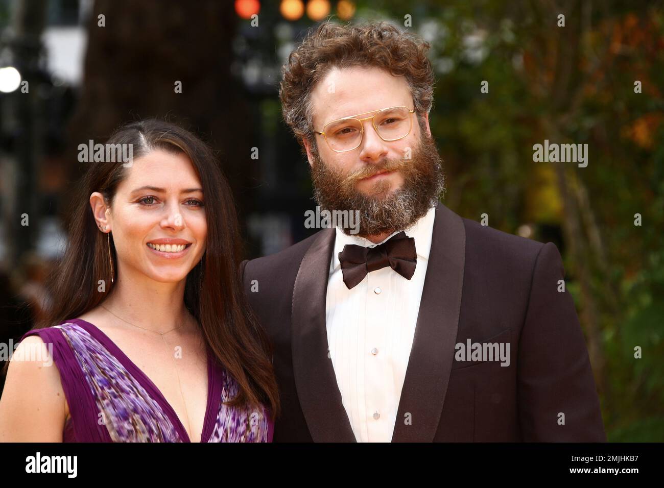 Actors Seth Rogen, right, and Lauren Miler pose for photographers upon ...