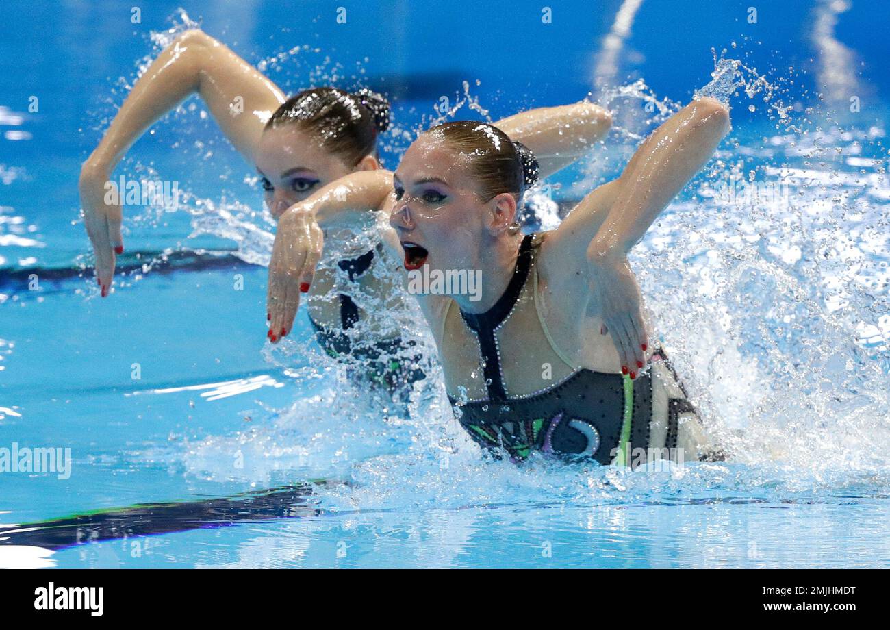 Russia's Svetlana Kolesnichenko and Svetlana Romashina perform their ...