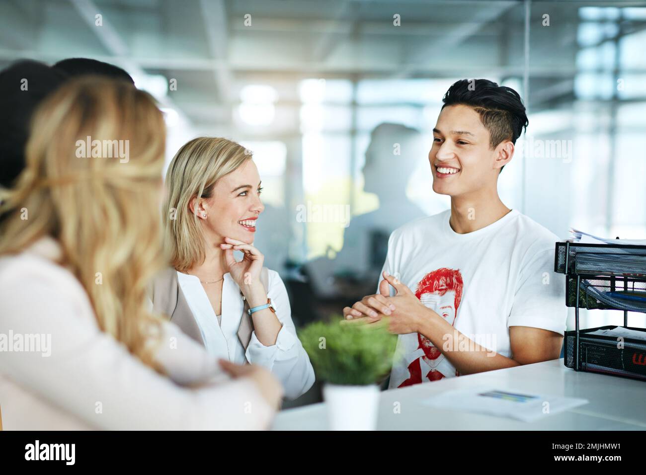 Have you guys heard the latest update. a group of colleagues having a ...