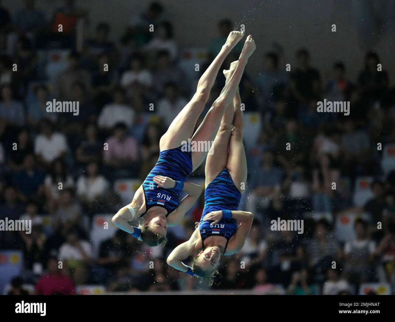 Russia's Iuliia Timoshinina and Ekaterina Beliaeva compete during the women's 10m synchro ...