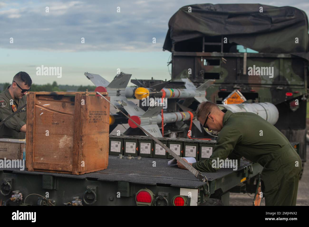 U.S. Marines with Marine Attack Squadron (VMA) 223 prepare to transport ...