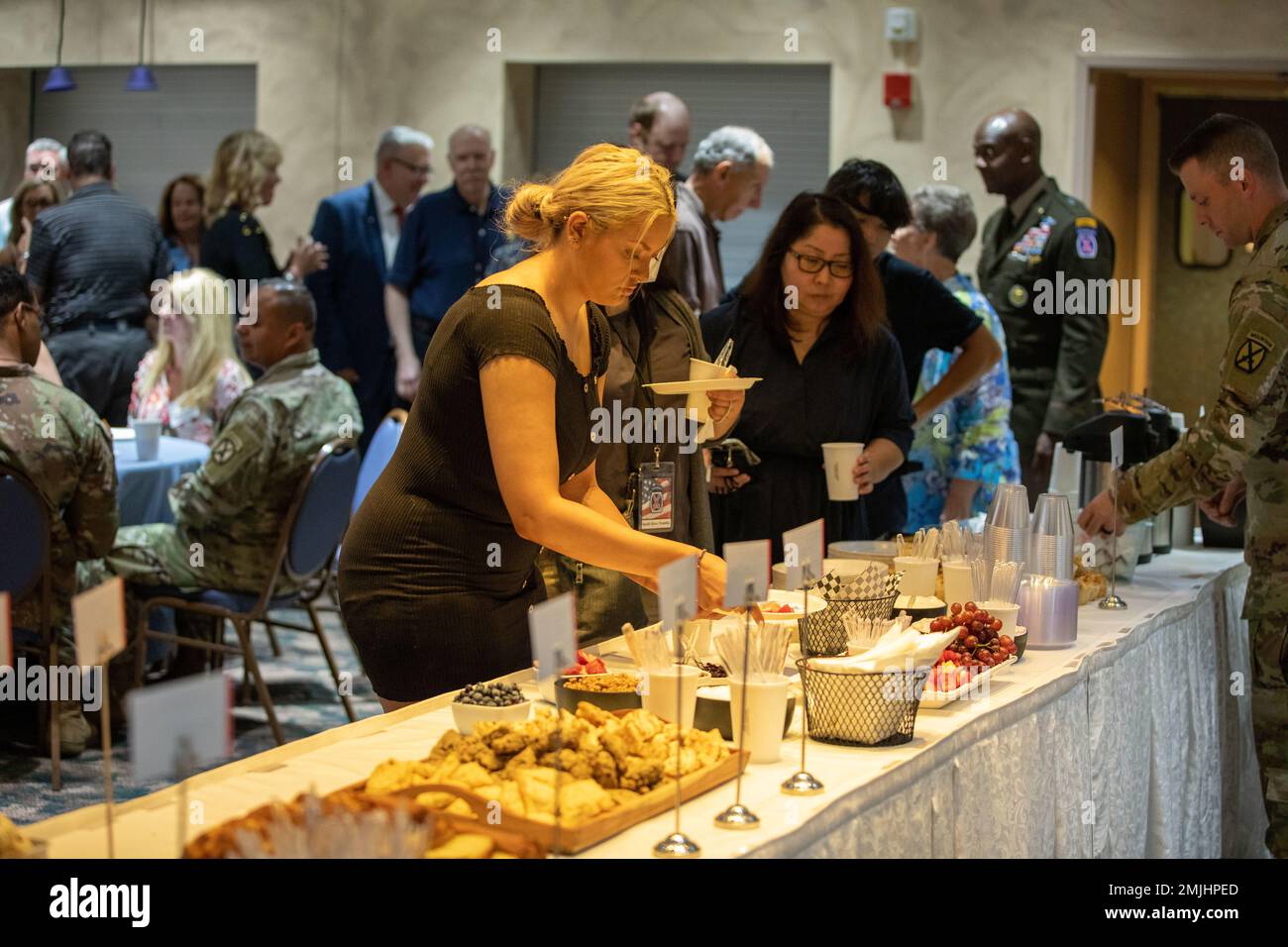 Gold Star Family members plate their food during a Spiritual Readiness ...