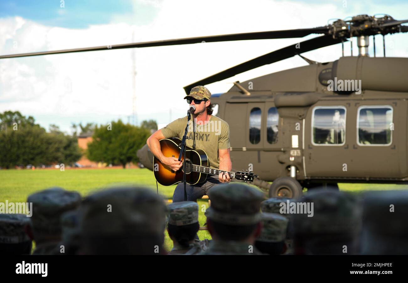 Country music singer-songwriter Riley Green performs before a group of ...