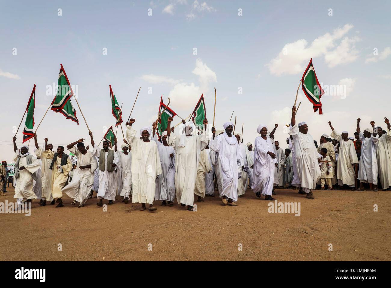 A crowd gathers as Gen. Mohammed Hamdan Dagalo, the deputy head of the ...