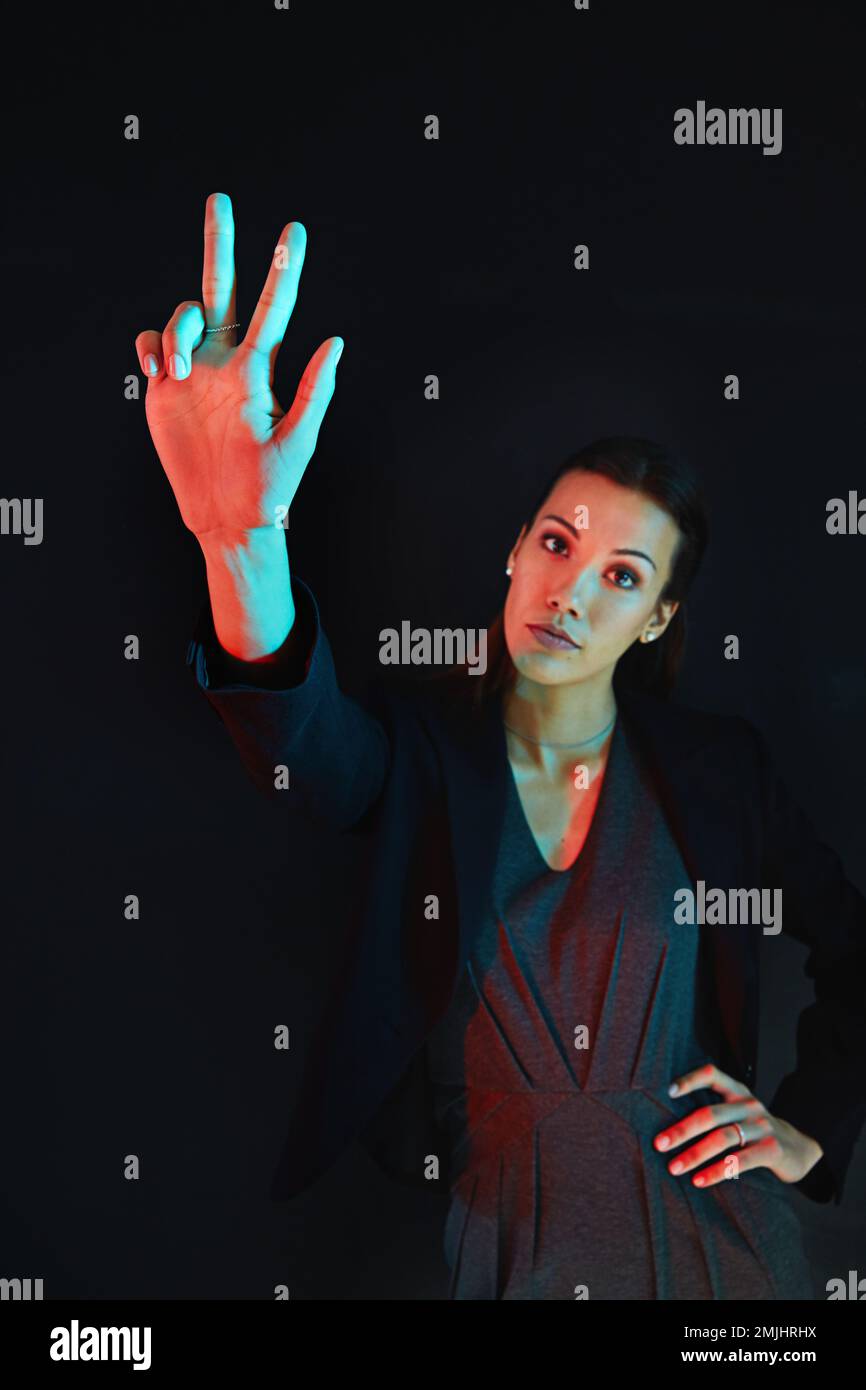 Counting down your chances. Portrait of a young businesswoman showing a ...