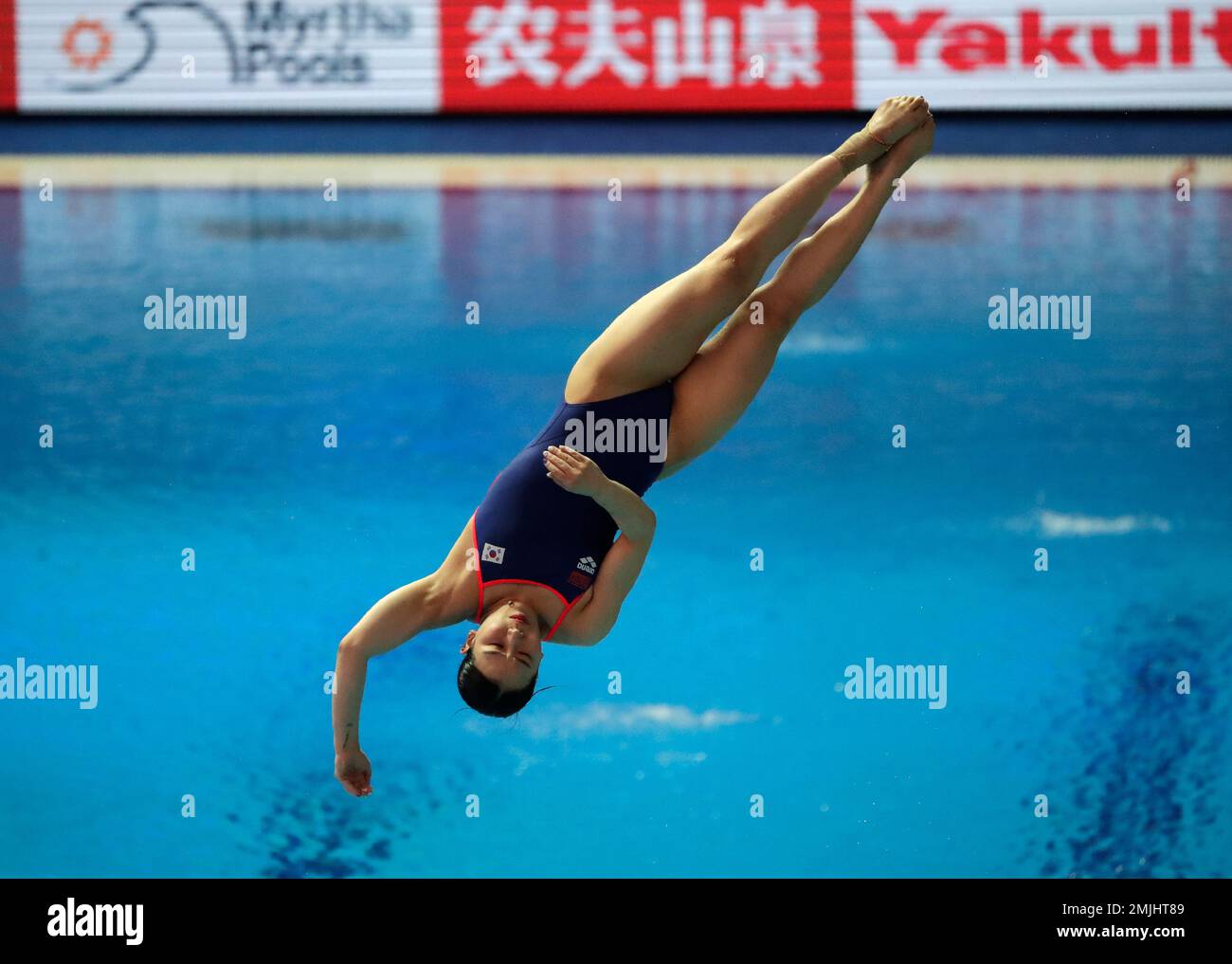 South Korea's Kim Su-ji competes during the women's 1 meter springboard ...