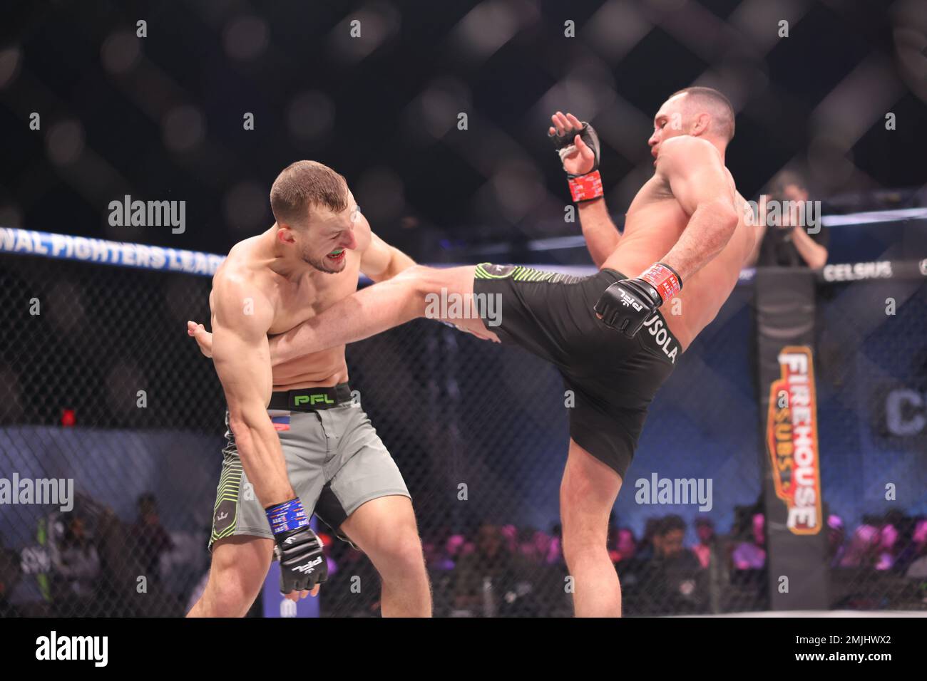 ORLANDO, FL - JANUARY 27: (R-L) Zach Juusola lands a body kick during ...