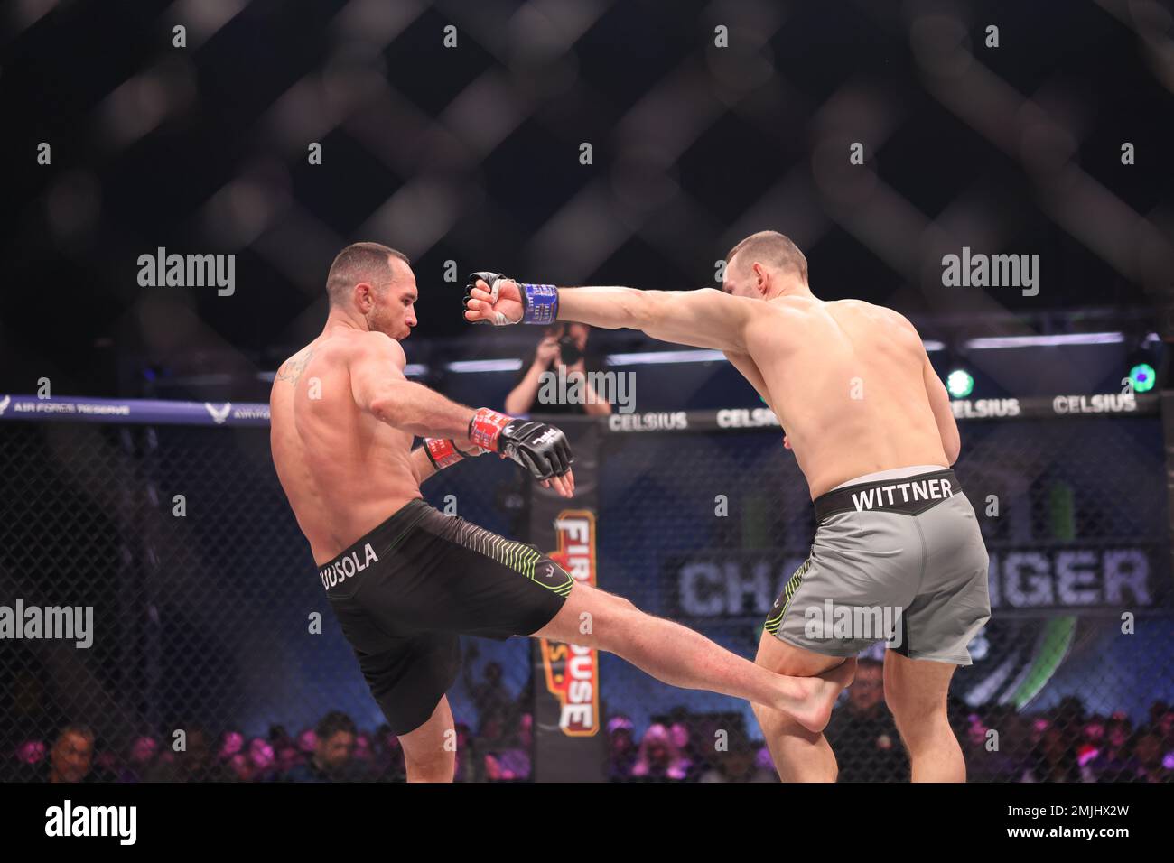 ORLANDO, FL - JANUARY 27: (L) Zach Juusola lands a low kick during week ...