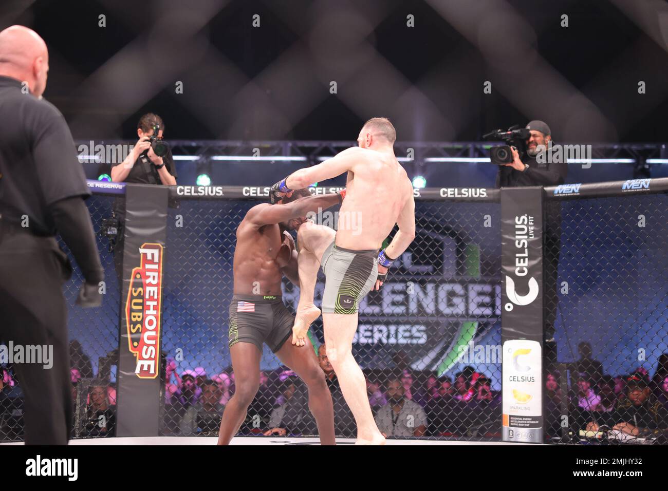 ORLANDO, FL - JANUARY 27: (R-L) Nick Alley throws a knee against Kendly ...