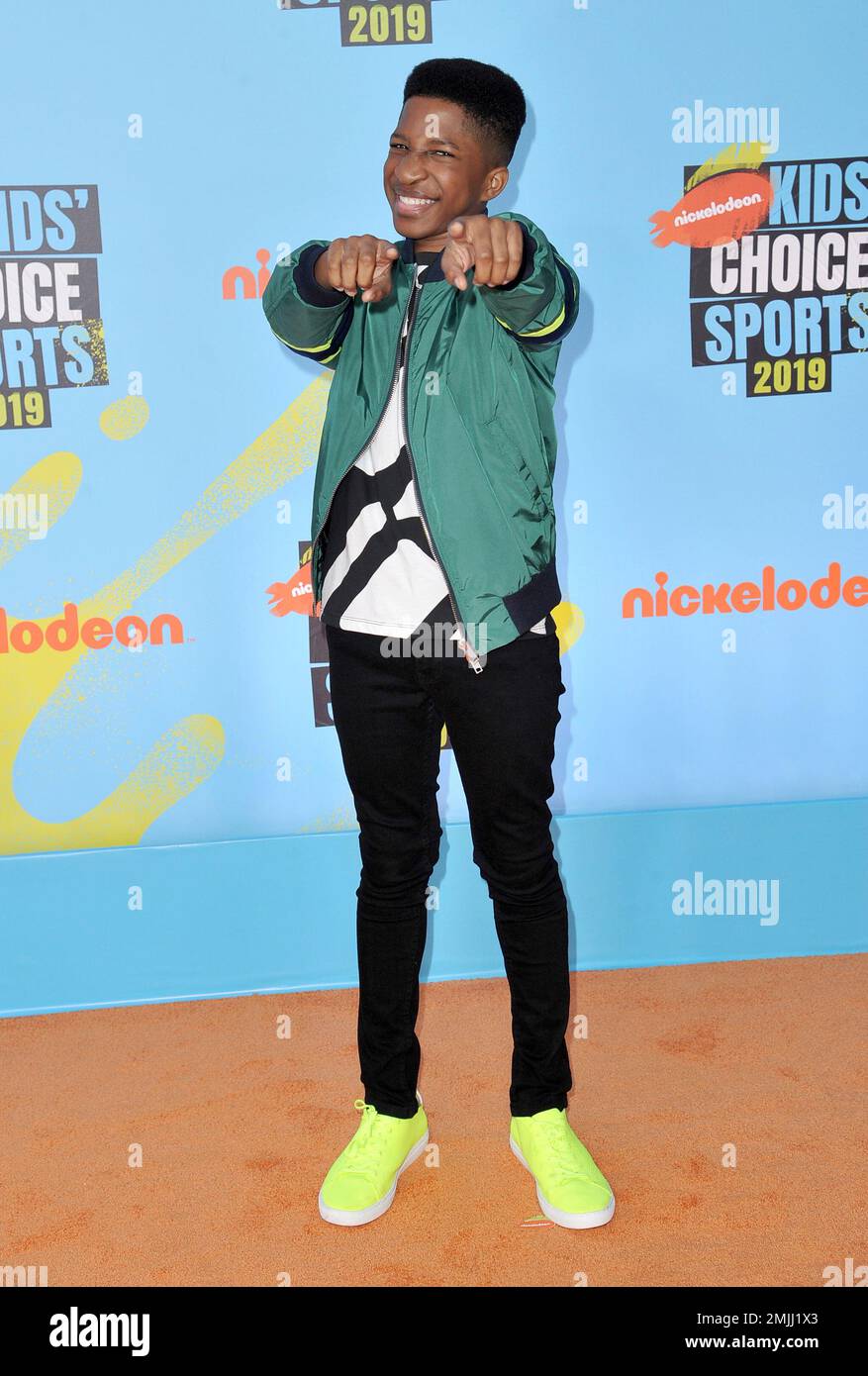 Lex Lumpkin arrives at the Kids' Choice Sports Awards on Thursday, July ...