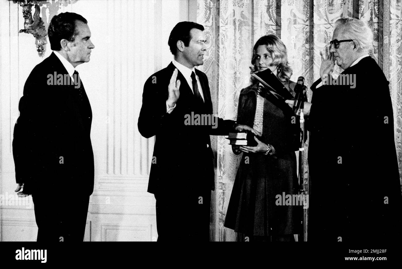 Donald Rumsfeld, new U.S. ambassador to NATO, takes the oath from Chief ...