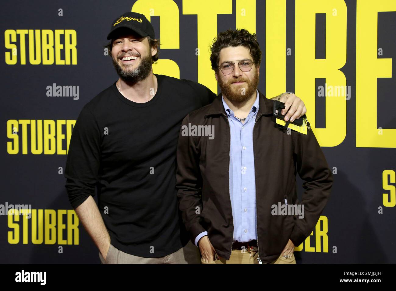 Ike Barinholtz, left, and Adam Pally attend the LA Premiere of "Stuber ...