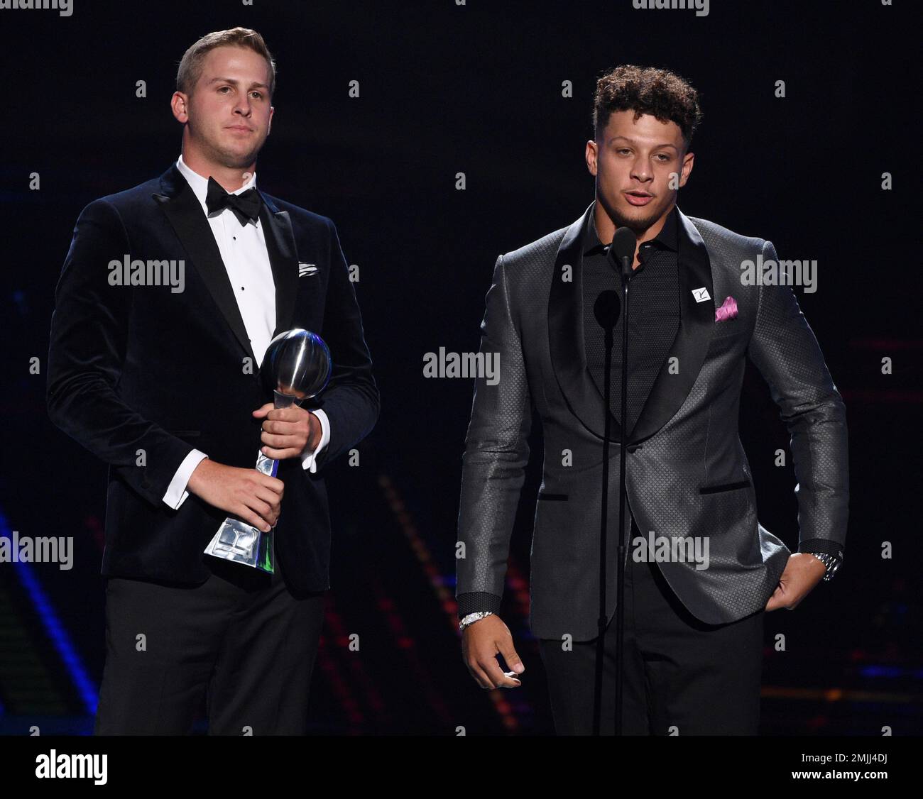 NFL players Jared Goff, of the Los Angeles Rams, left, and Patrick ...