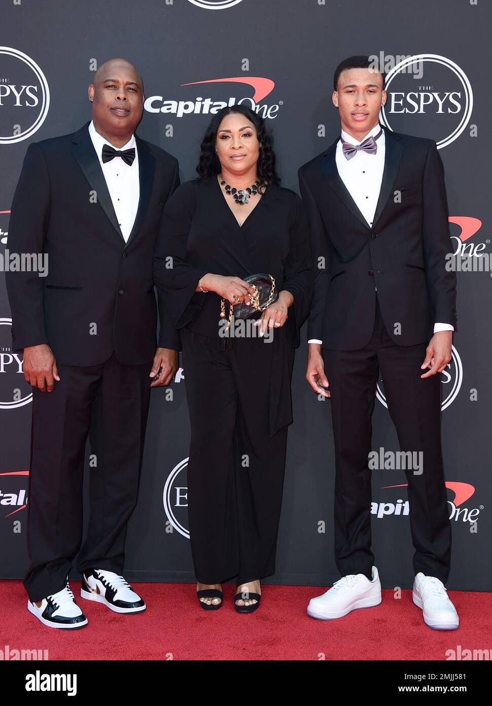 Rod Hampton, from left, Markita Hampton and RJ Hampton arrive at the ...