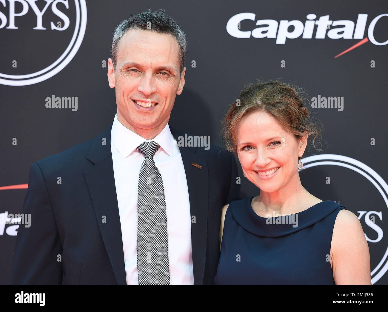 President of ESPN inc. James Pitaro, left, and Jean Louisa Kelly arrive ...