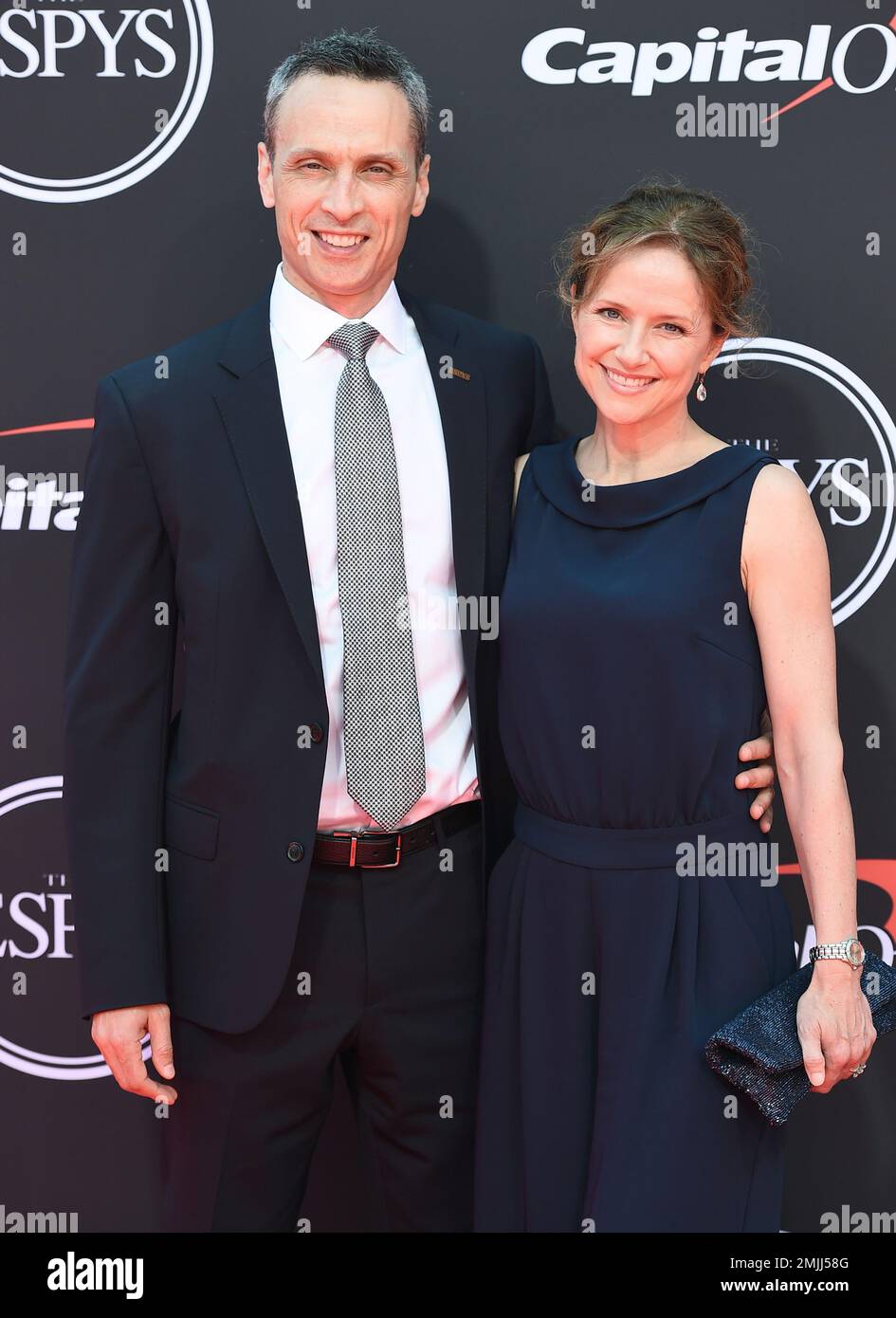 President of ESPN inc. James Pitaro, left, and Jean Louisa Kelly arrive ...