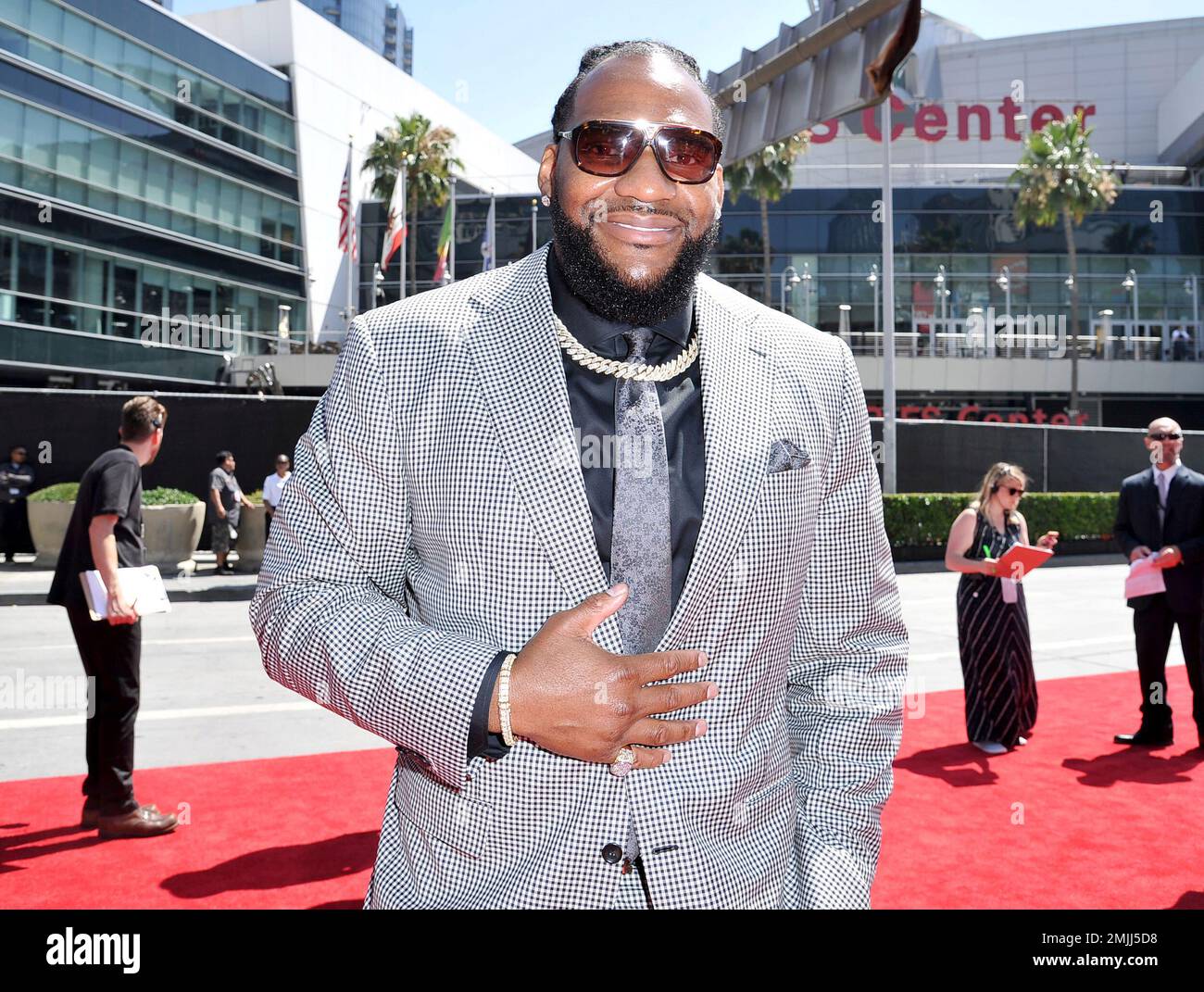 NFL player, Ty Nsekhe, of the Buffalo Bills, arrives at the ESPY Awards ...