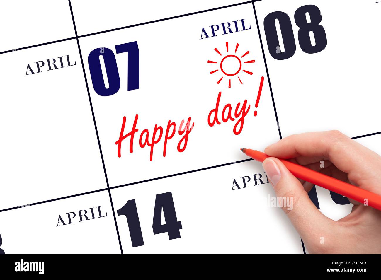7th day of April. Hand writing the text HAPPY DAY and drawing the sun ...