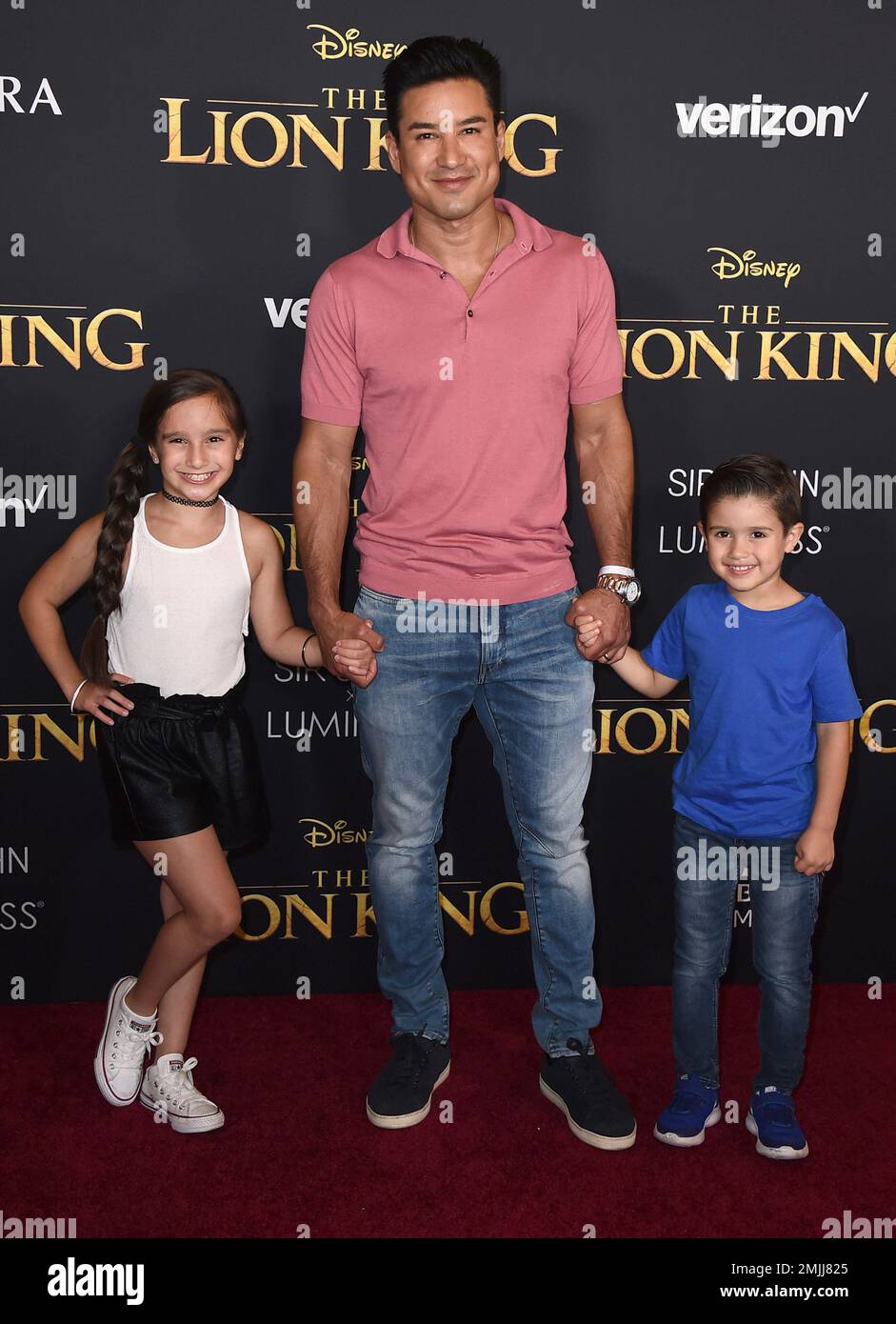 Mario Lopez poses with his son Dominic, right, and daughter Gia, left ...