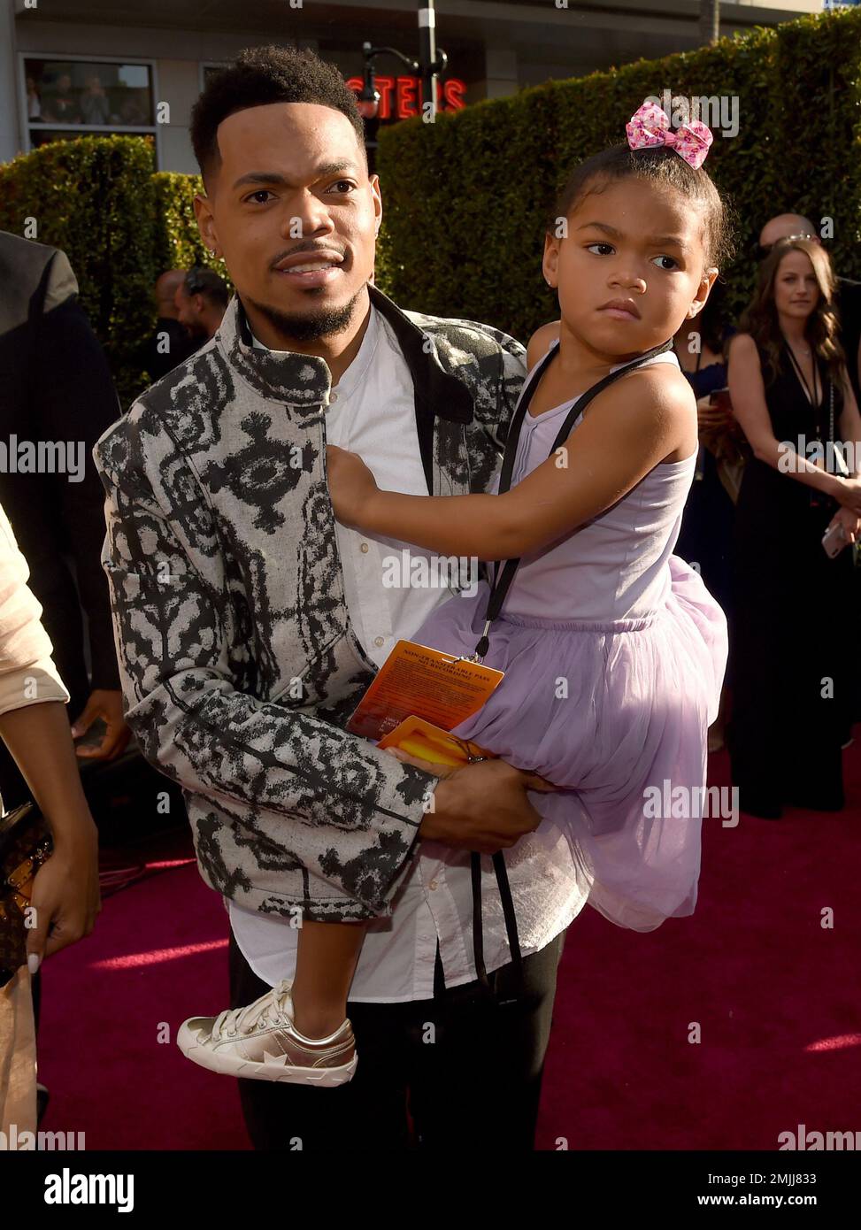 Chance the Rapper and his daughter Kensli arrive at the world premiere ...