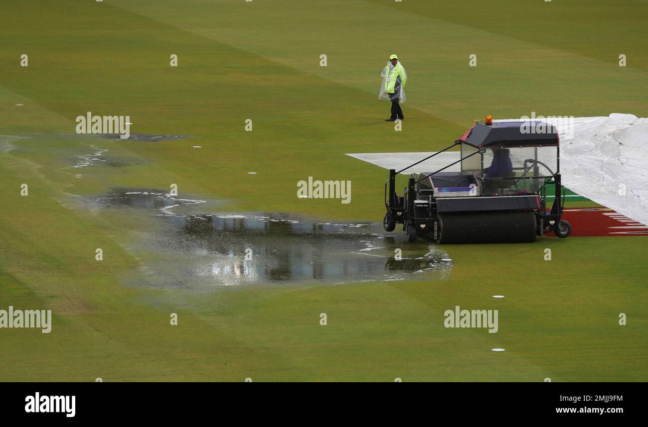 A super sopper is used to remove water after rain stopped play during ...