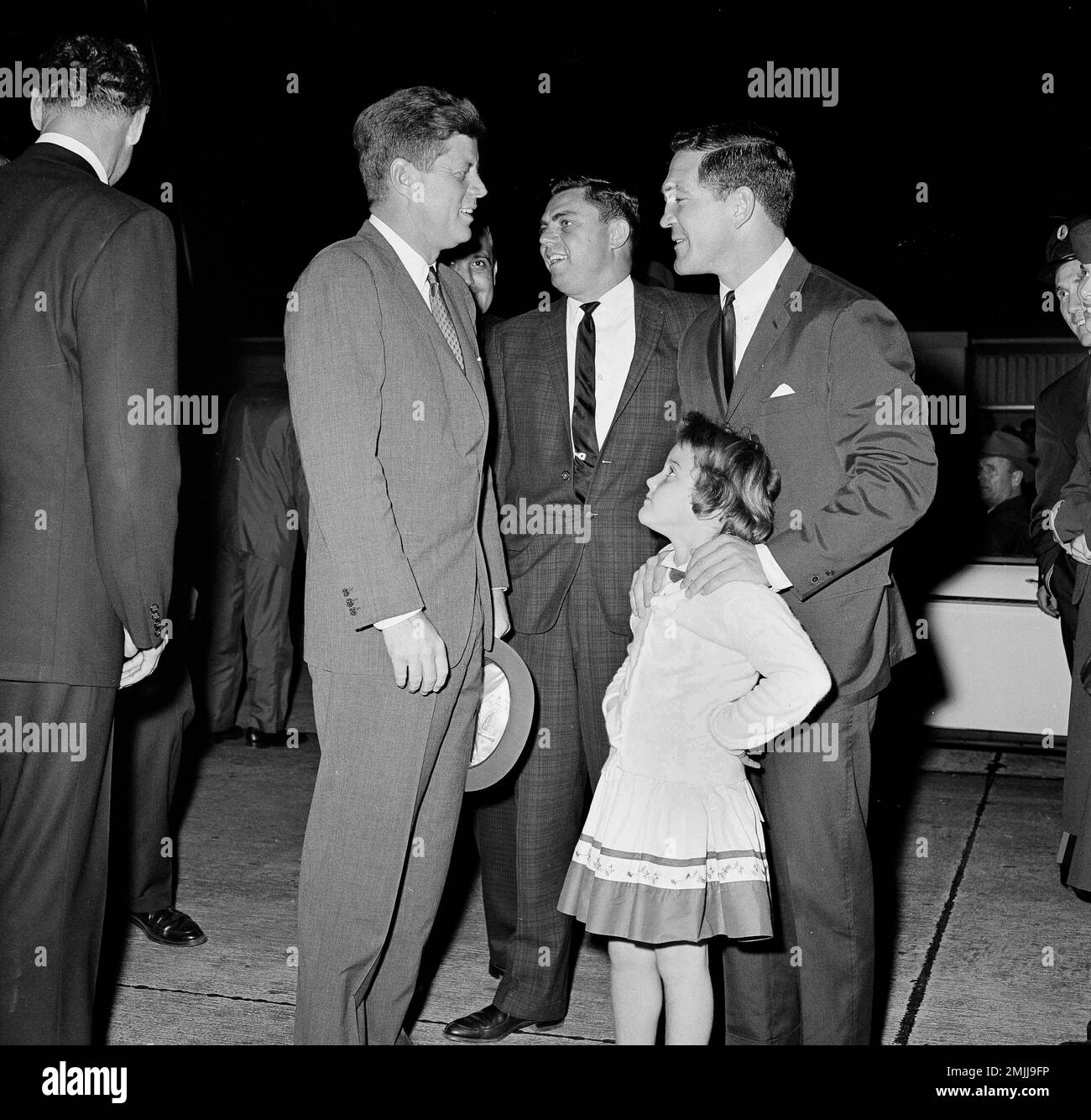 Six-year-old Jane Vessels meets President John F. Kennedy and gazes in ...