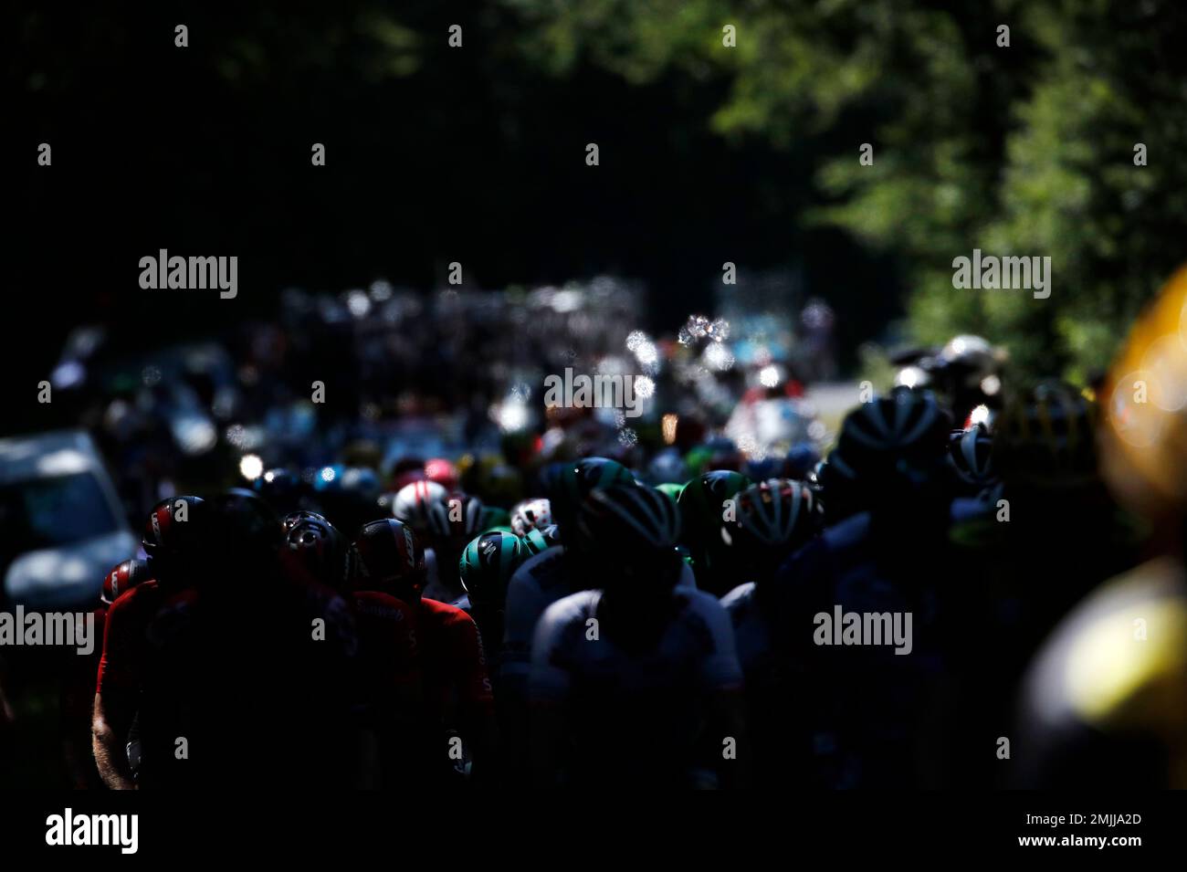 The pack rides during the fourth stage of the Tour de France cycling ...