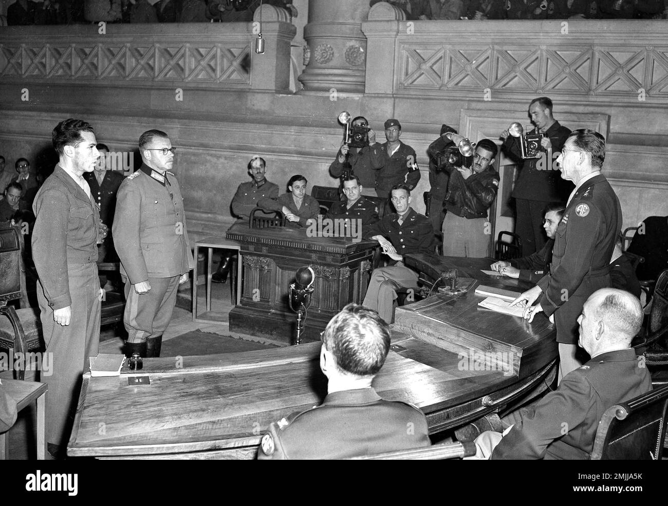 Major General Lawrence Jaynes, standing right, president of the ...