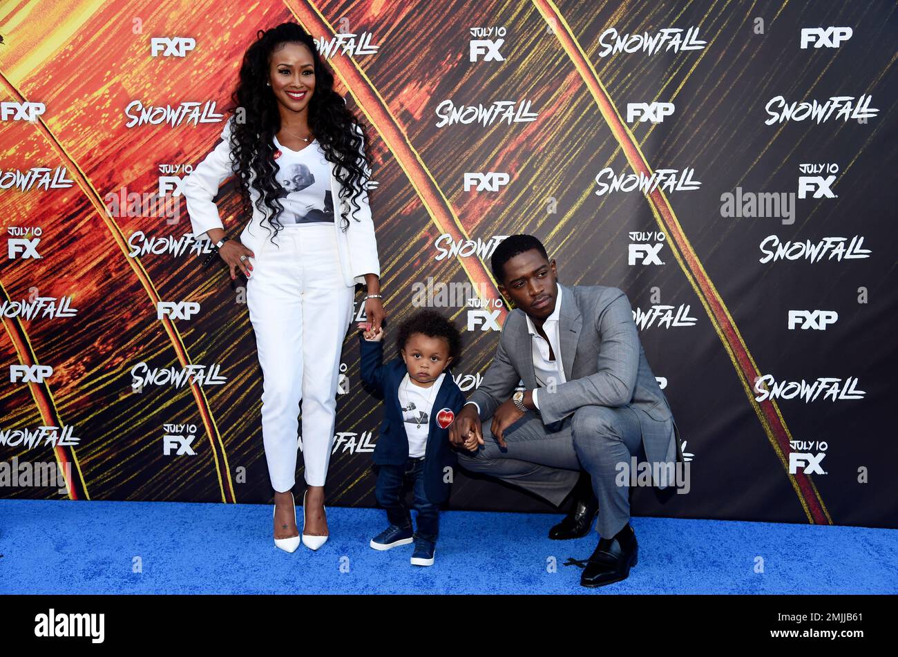 Seven John Singleton, center, the son of the late "Snowfall" co-creator/executive producer John ...