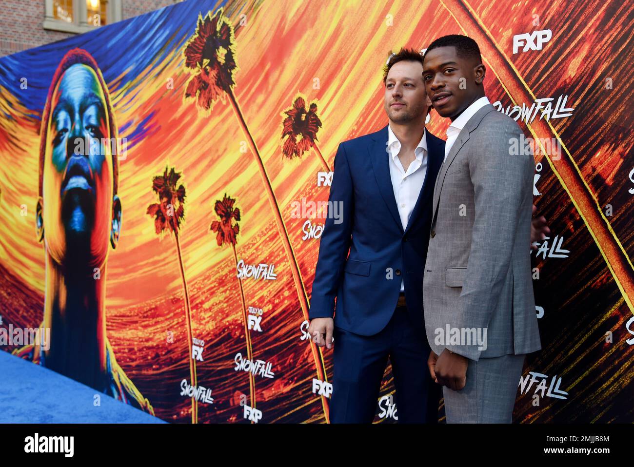 Damson Idris, right, star of the FX television series "Snowfall," poses ...