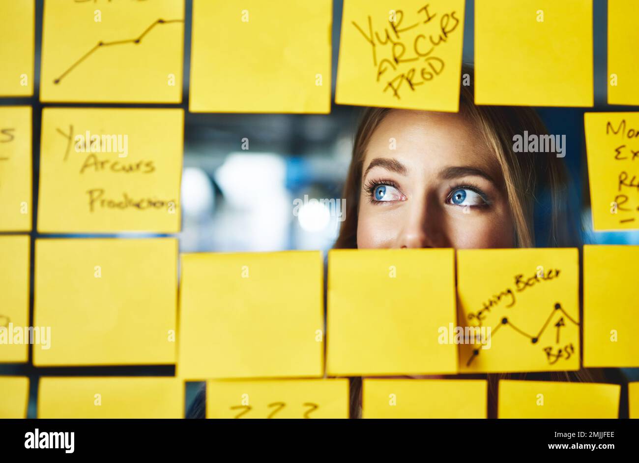 The mind of the creative genius never stops. a young woman having a ...