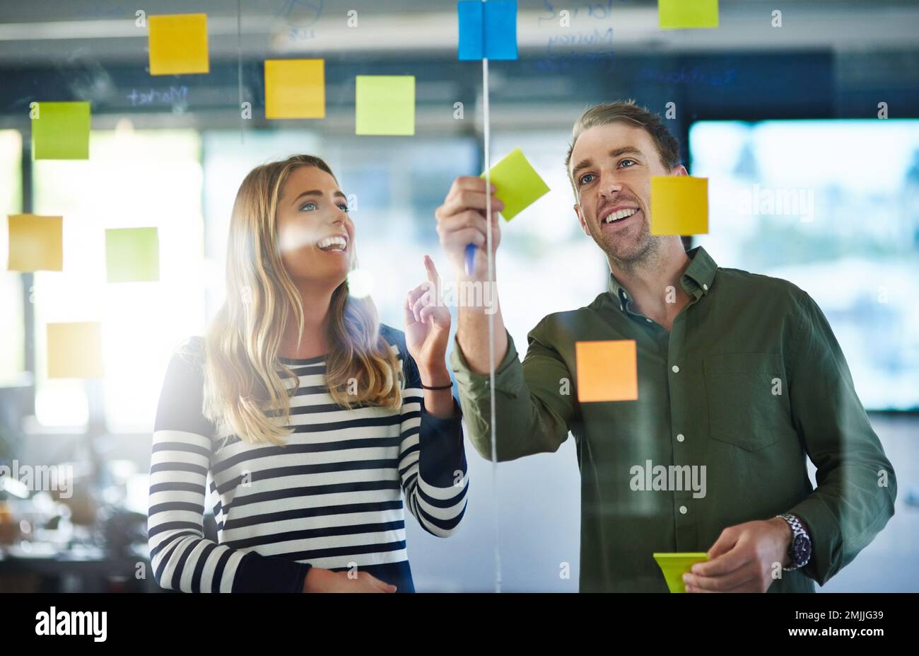 Expanding on a great idea. colleagues having a brainstorming session ...