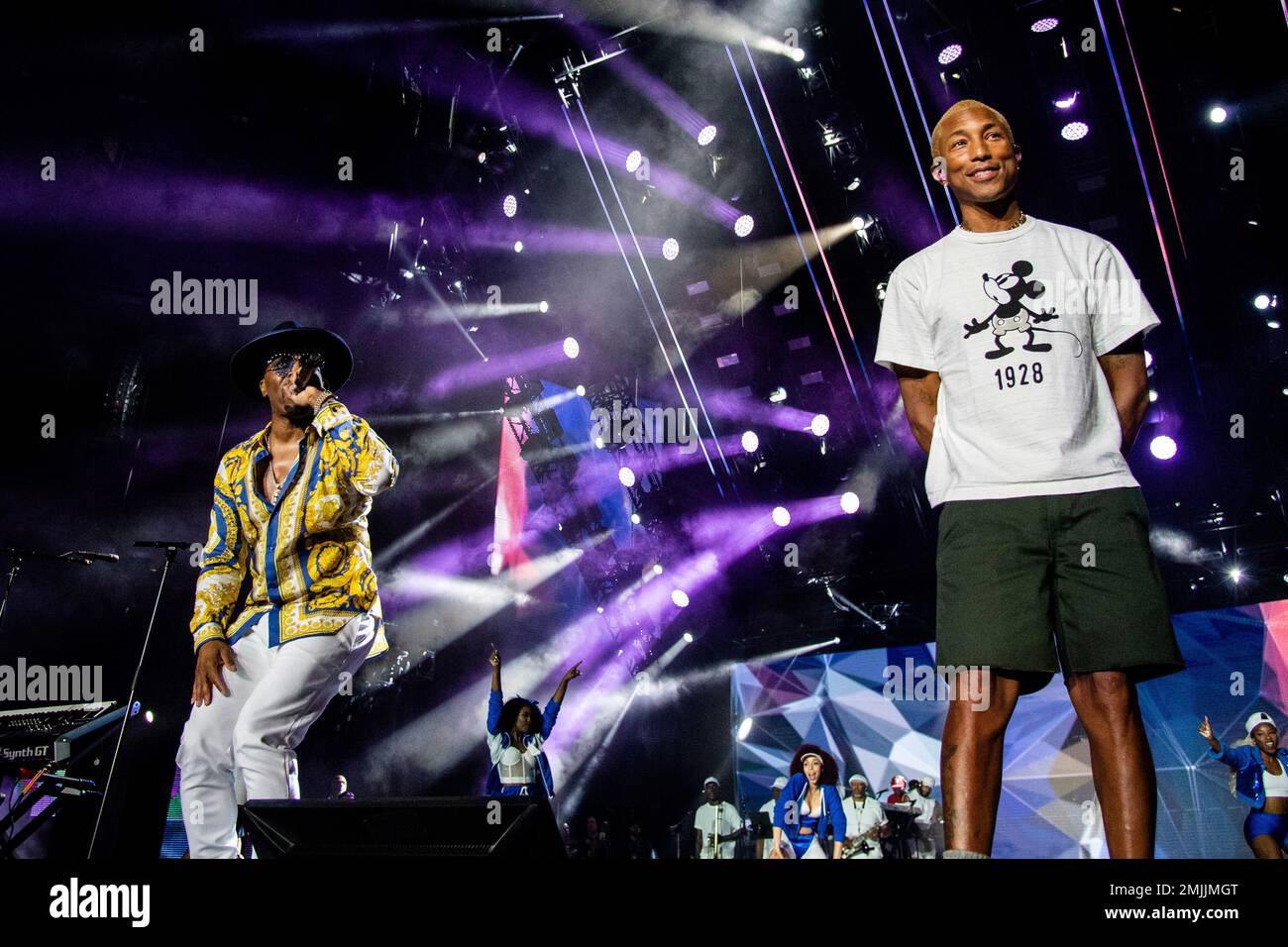 Teddy Riley, left, and Pharrell Williams perform at the 2019 Essence ...