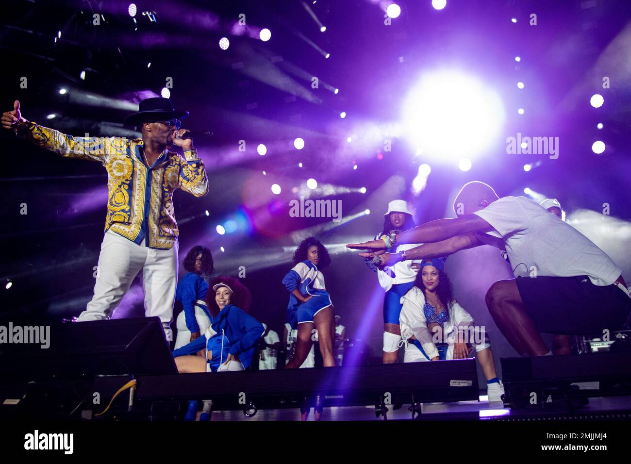 Teddy Riley, left, and Pharrell Williams perform at the 2019 Essence ...