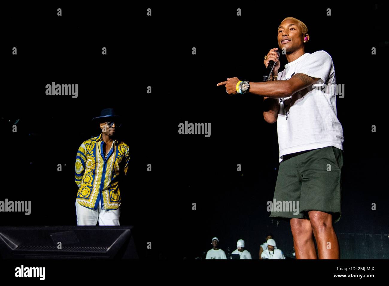 Teddy Riley, left, and Pharrell Williams perform at the 2019 Essence ...