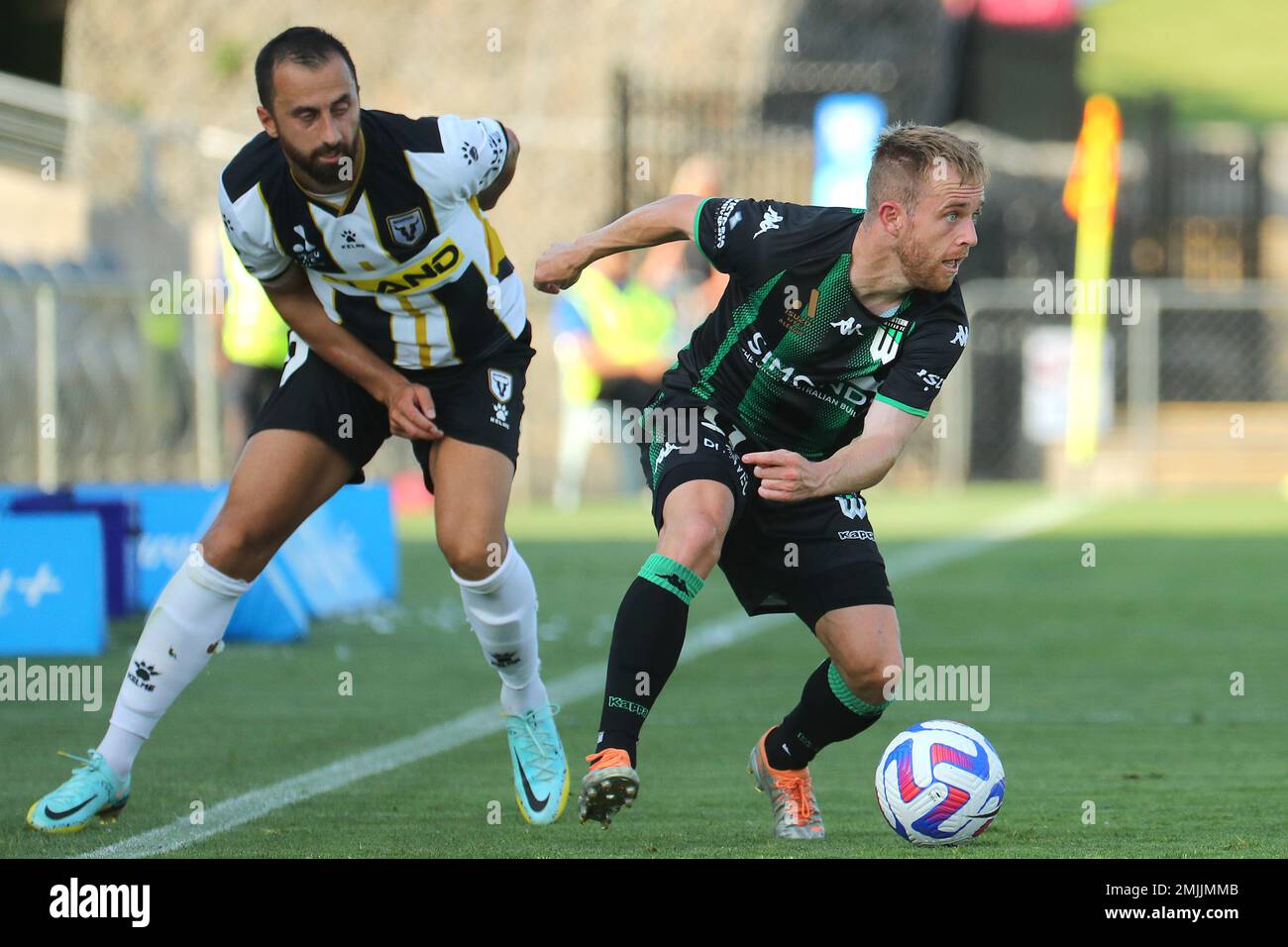 Connor Pain of United and Bachana Arabuli of the Bulls challenge for ...