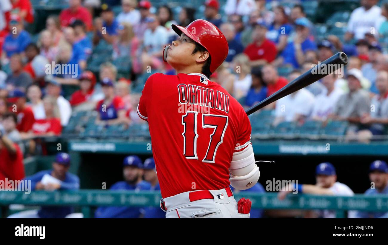Los Angeles Angels' Shohei Ohtani follows through on a swing during a ...